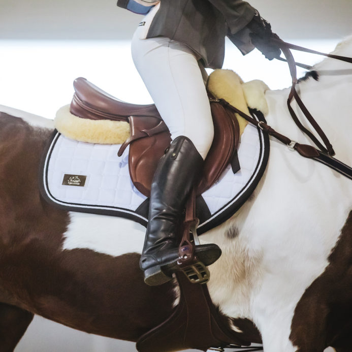Iconic Equestrian Wants You to Stop Stressing Over Dirty Saddle Pads